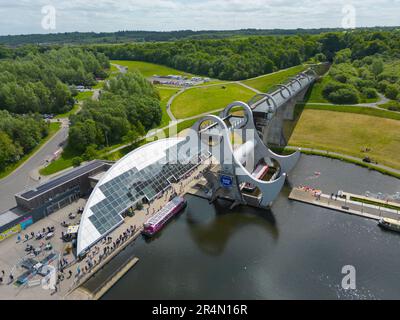 Aerial view from drone of Falkirk Wheel rotating boat lift on Forth and ...