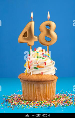 Candle number 48 - Cake birthday in coral fusion background Stock Photo ...