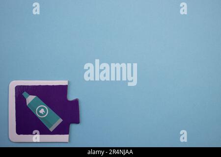 Information puzzles, photographed from above, placed on a blue ...