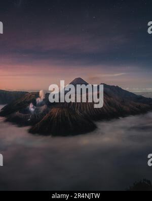 night scenery bromo mountain with star trails Stock Photo - Alamy