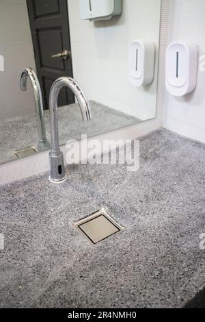 Touchless tap in public toilet and restroom, stock photo Stock Photo ...