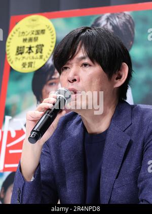 Japanese screenwriter Yuji Sakamoto speaks at a press conference after ...
