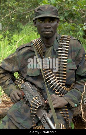 A Ugandan Army PKM light machine gun laid out on the floor of the ...