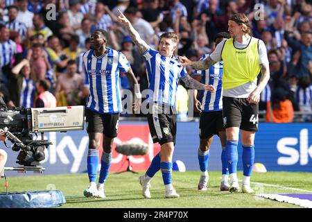 Sheffield Wednesday's Josh Windass celebrate with the trophy following ...