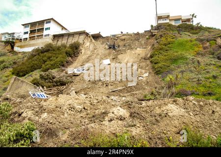 Loosened by heavy rain, a landslide on a cliff hillside in San Clemente ...
