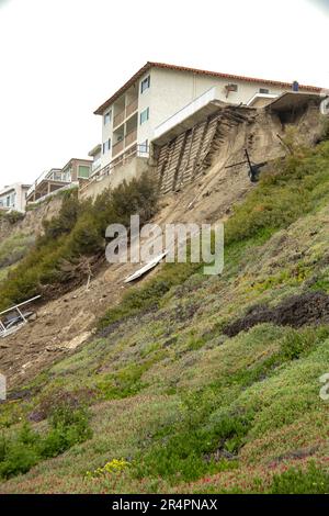 Loosened by heavy rain, a landslide on a cliff hillside in San Clemente ...