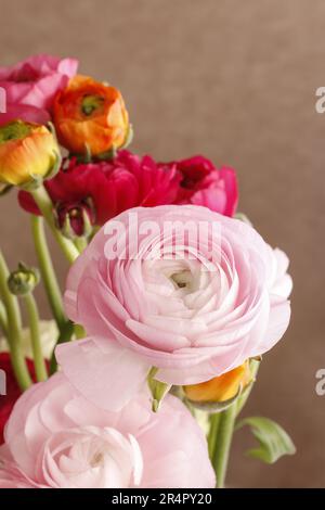 Bouquet of colorful ranunculus flowers. Party decor Stock Photo - Alamy