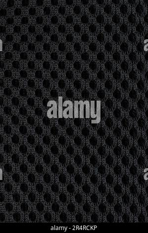 A close up view up at the holes and shapes in a rock formation at Stone ...