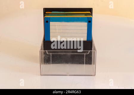 A black container is filled with computar external storage floppy ...