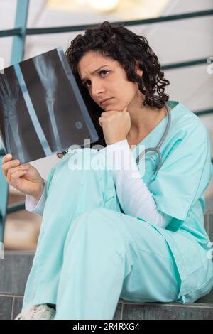 Doctor examine MRI picture working at night. Medical test with x-ray ...