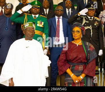 Abuja, Nigeria. 29th May, 2023. Bola Ahmed Tinubu (Front) waves to people after being sworn in ...