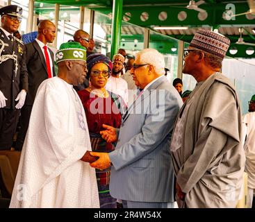 Abuja, Nigeria. 29th May, 2023. Bola Ahmed Tinubu (Front) waves to people after being sworn in ...