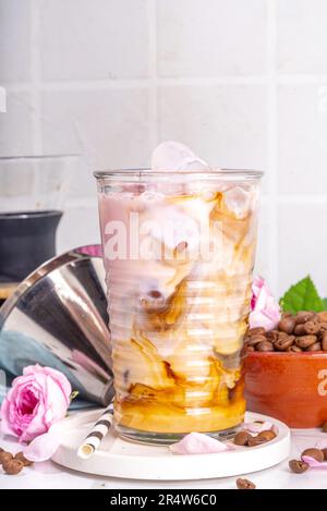 Iced Rose flower latte coffee drink, with pink rose petals taste almond ...