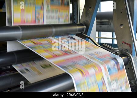 printing of coloured newspapers with an offset printing machine at a ...