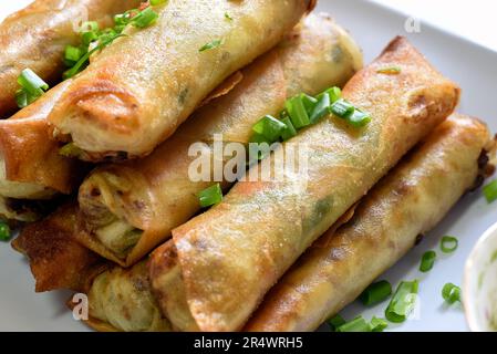 Lumpiang Shanghai with sprinkled spring onions - a Filipino food Stock ...
