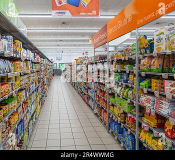 Aisles with products inside a modern supermarket in Brazil, selective ...