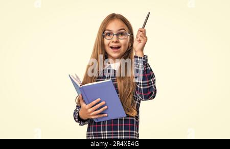 school girl noting notes having new idea. photo of school teen noting ...