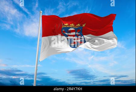flag of German peoples Hessians at cloudy sky background, panoramic ...