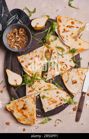 Ham and Cheddar cheese Mexican tortillas with sour cream Stock Photo ...