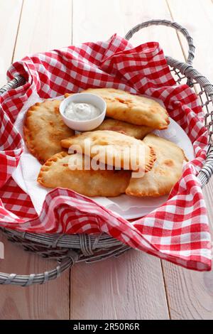 Deep fried Chebureki (dumplings with meat filling, Russia Stock Photo ...