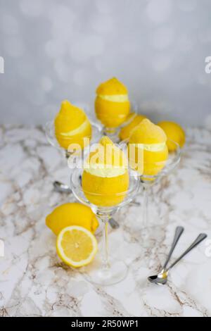 Fresh lemon ice cream served on a plate Stock Photo - Alamy