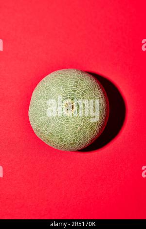 From above rockmelon sweet melon and peach slice near glass placed on ...