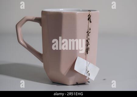 Ants on a cup in the house - coming in on a string Stock Photo - Alamy