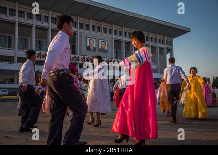 Mass dance in the streets on Pyongyang, North Korea Stock Photo - Alamy