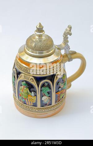 The photograph beautifully decorated traditional German mug for beer ...