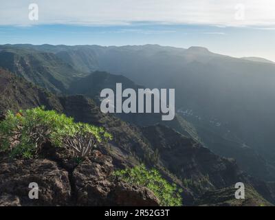 Geen plateau on top of La Merica mountain on valley with winding roads ...
