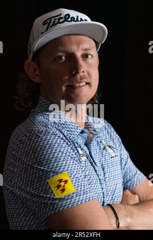 Captain Cameron Smith of Ripper GC reads his putt on the fourth green ...
