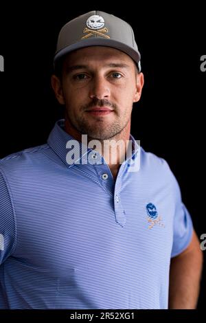 Captain Bryson DeChambeau Of Crushers GC Walks The 18th Green During captain-bryson-dechambeau-of-crushers-gc-walks-the-18th-green-during
