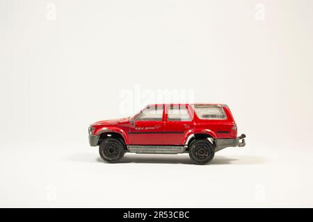 Sport Utility Vehicle toy car red color on white background Stock Photo ...
