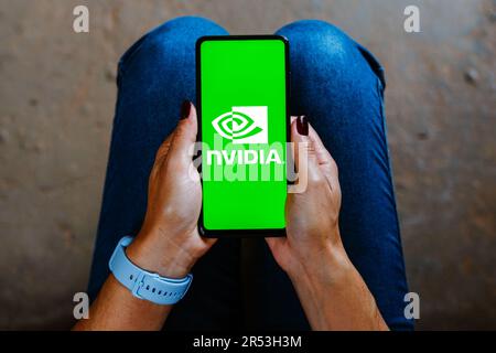 In this photo illustration, the Nvidia Corporation logo is seen ...