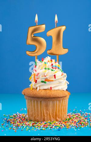 Candle number 51 - Cake birthday in orange background Stock Photo - Alamy