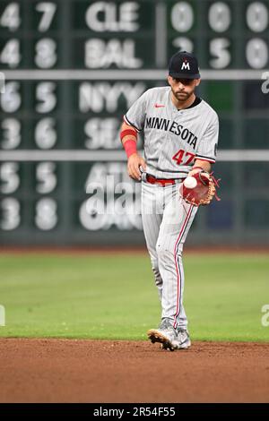 Minnesota Twins' Edouard Julien takes infield practice before a ...