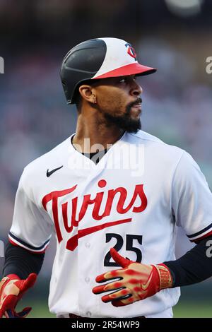 Byron Buxton #25 of the Minnesota Twins jogs to the dugout during a ...