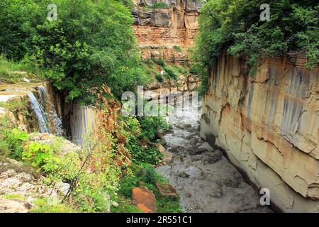 Waterfall and river in the mountains. Gryz village. Guba region ...