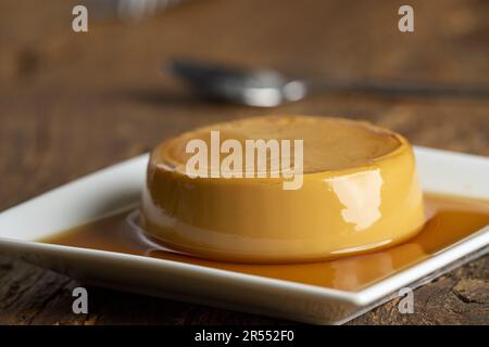 French Flan On Dark Wood Stock Photo - Alamy