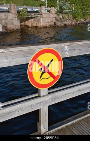 Warning Notice Danger Jetty Unsafe Keep Out refers to the old wooden ...