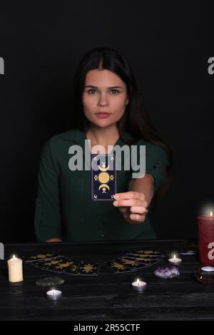 Soothsayer predicting future indoors. Focus on tarot cards Stock Photo ...