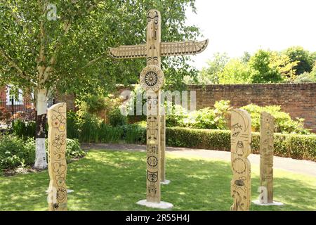 Totem Poles in children's play area within Stoke Park Gardens public ...