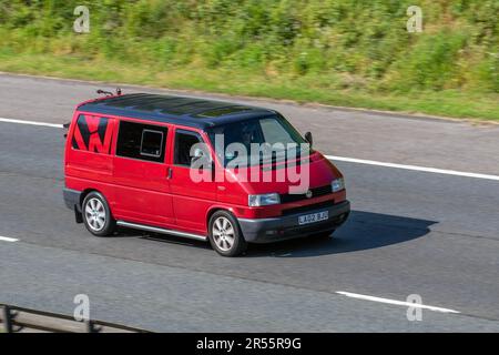 Red Volkswagen VW T4 van alloy wheels and blue sky like painting in HDR ...