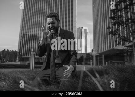 Desperate man crying during bad business. Angry businessman having bad ...