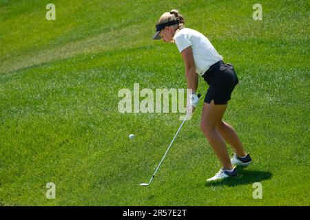 Lauren Hartlage hits from the rough on the eighth hole during the first ...