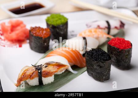 Classic japanese food- sushi on a white Stock Photo - Alamy
