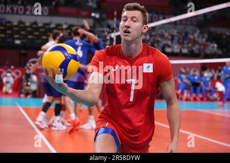 Dmitry Volkov, of the Russian Olympic Committee, spikes the ball during ...