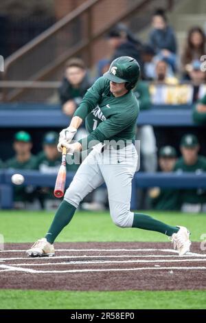 Michigan State Spartans shortstop Mitch Jebb (14) runs to first base ...