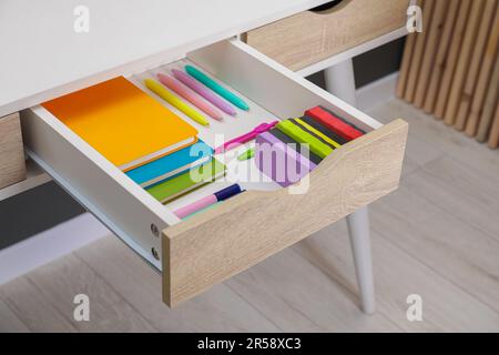 Office supplies in open desk drawer indoors, closeup Stock Photo - Alamy