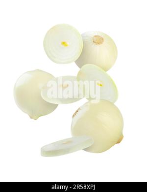 Whole and cut onion bulbs falling on white background Stock Photo - Alamy
